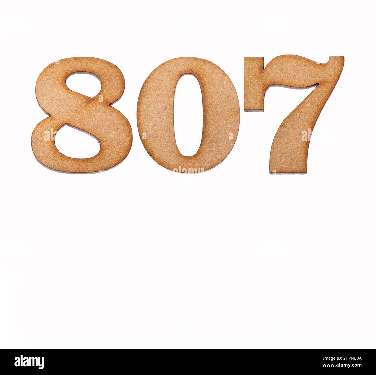 Number 807 in wood, isolated on white background Stock Photo - Alamy