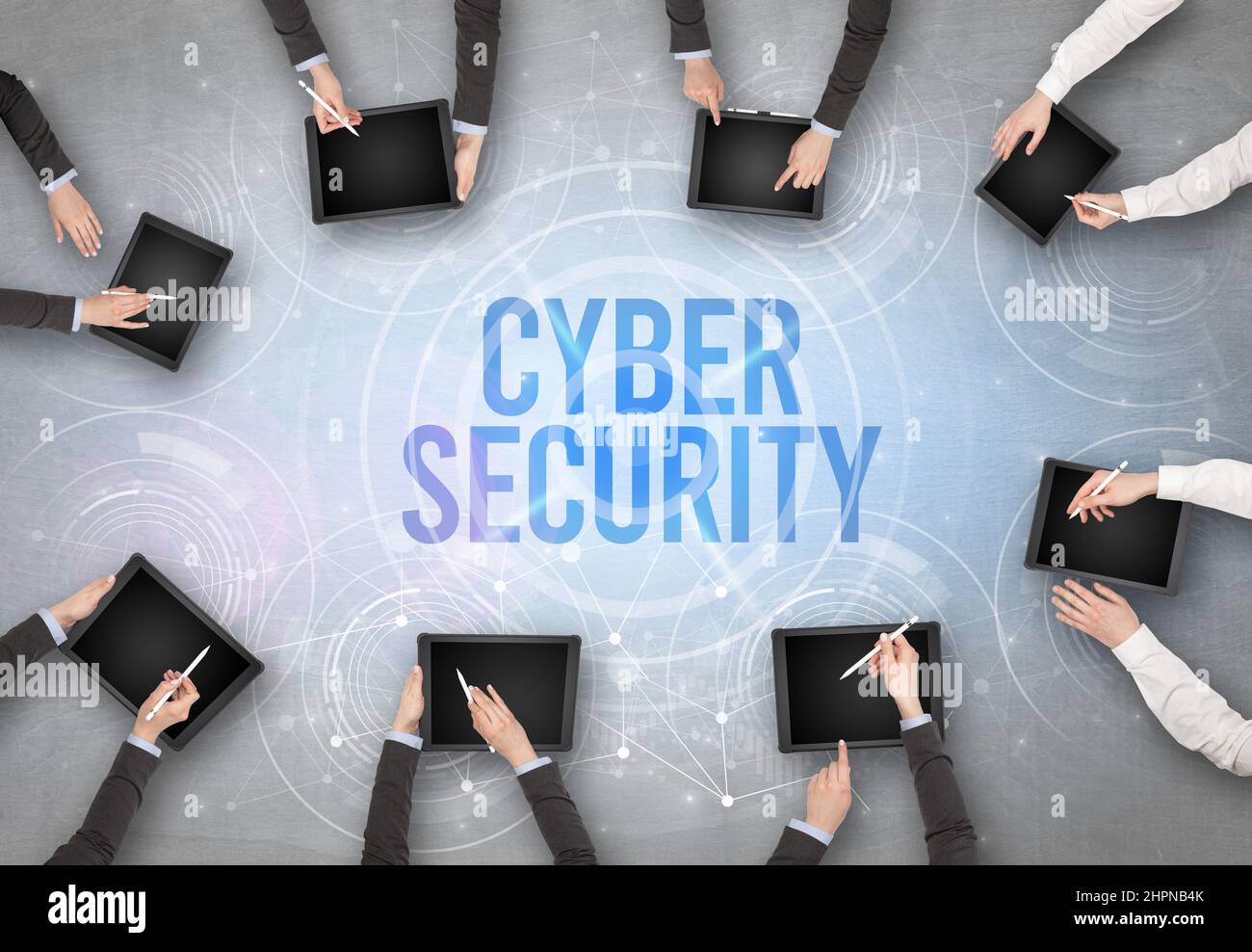 Group of people in front of a laptop, security concept Stock Photo - Alamy
