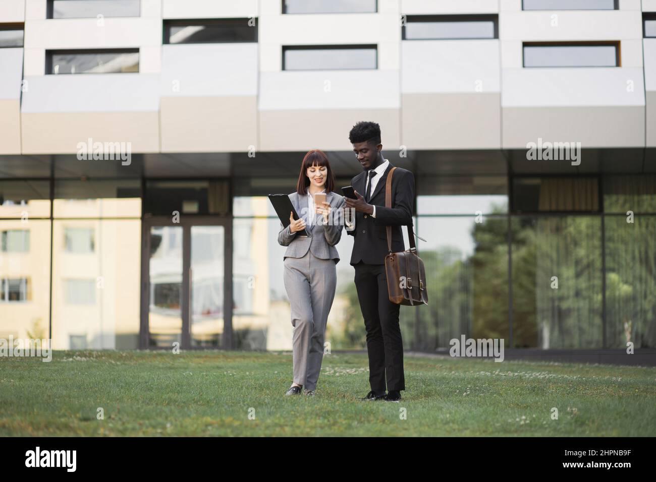 Contract signature as successful agreement. Happy international male ...