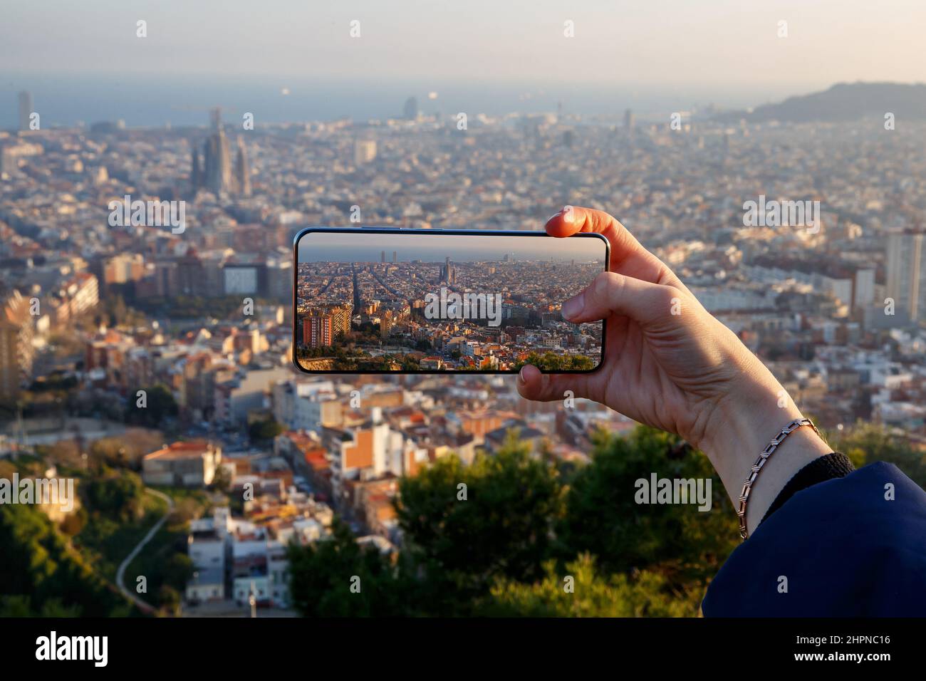 Photographing the panorama of Barcelona on a mobile phone Stock Photo ...