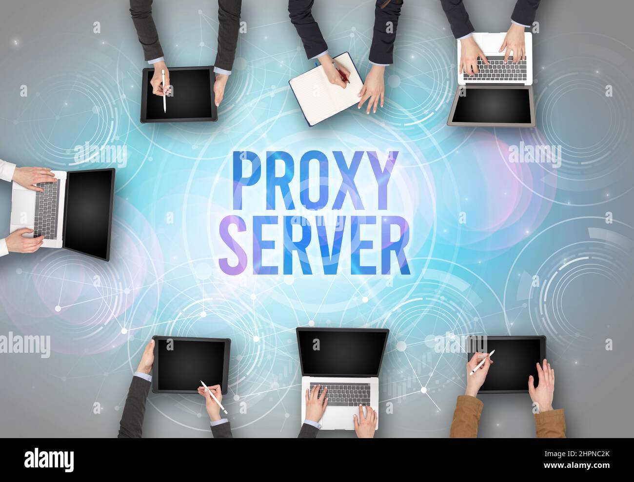 Group of people in front of a laptop, security concept Stock Photo - Alamy