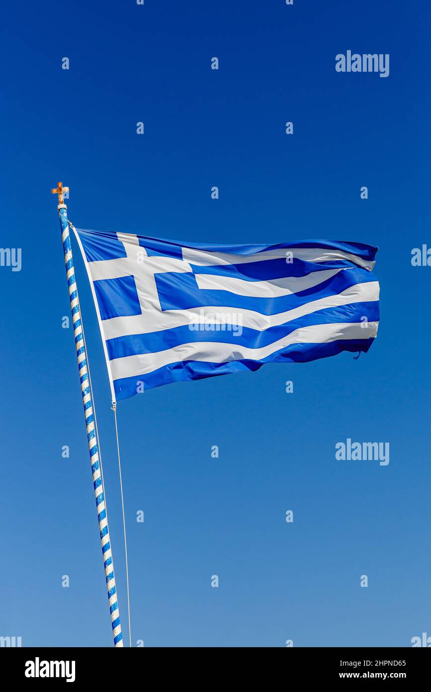 Greek flag waving against the blue sky Stock Photo - Alamy