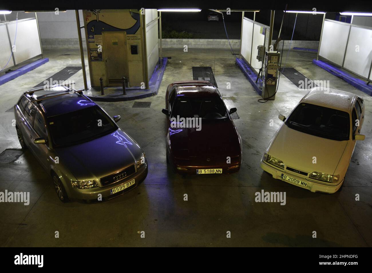 Old classic cars in a Self Service Car Wash at night Stock Photo - Alamy