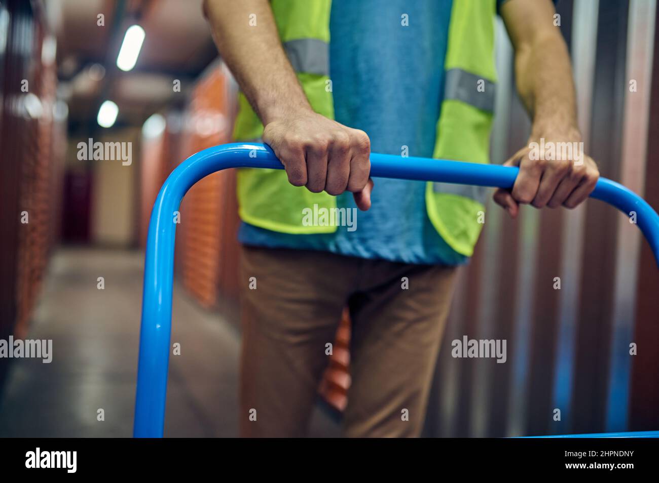 Warehouse pushing trolley hi-res stock photography and images - Alamy