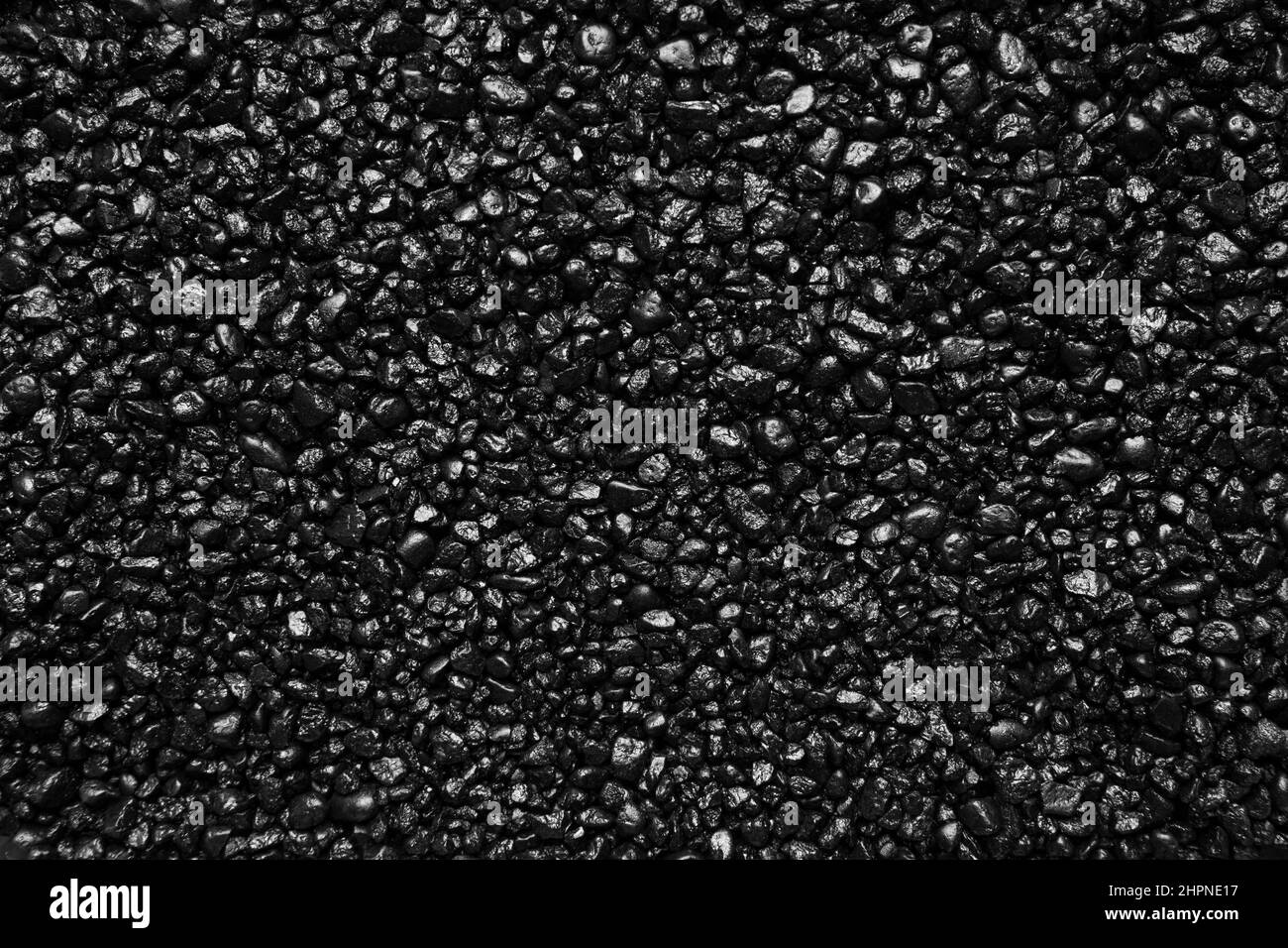 Shining black pebbles hi-res stock photography and images - Alamy