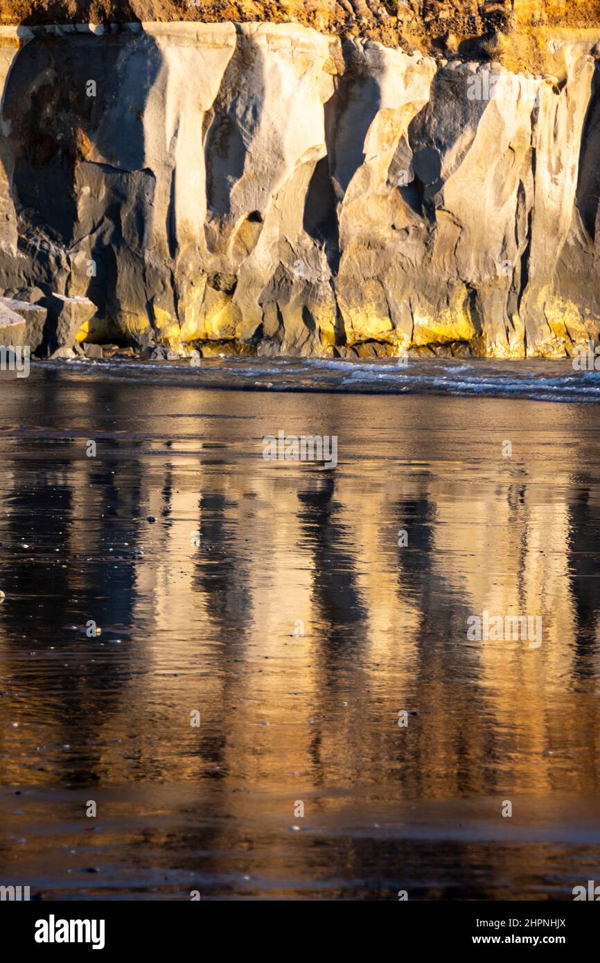 Late afternoon sunlight on cliffs at Kai Iwi Beach, near Wanganui ...