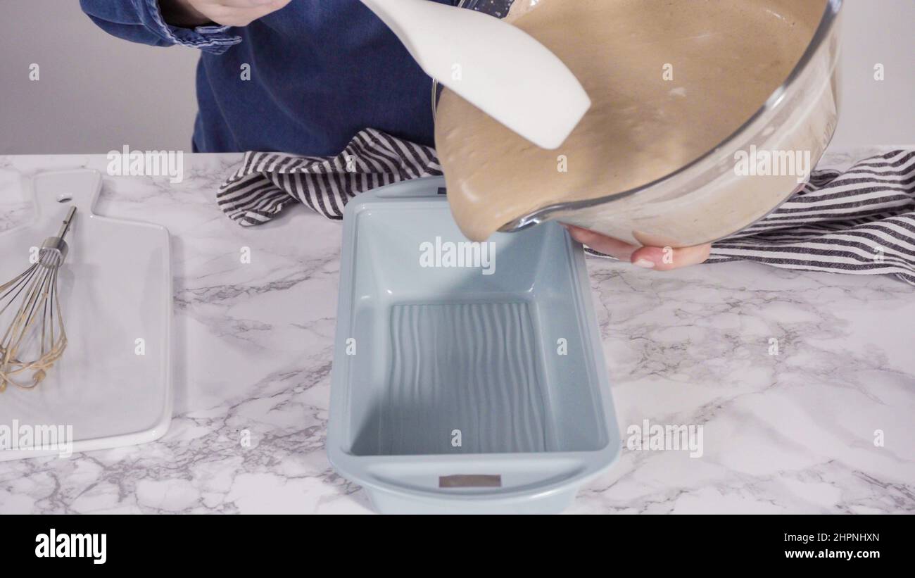 Step by step. Pouring homemade chocolate ice cream into a baking pan ...