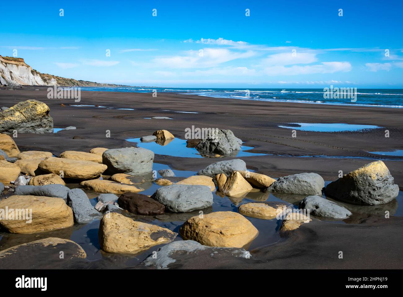 Rocks on beach, Kai Iwi Beach, near Wanganui, North Island, New Zealand ...