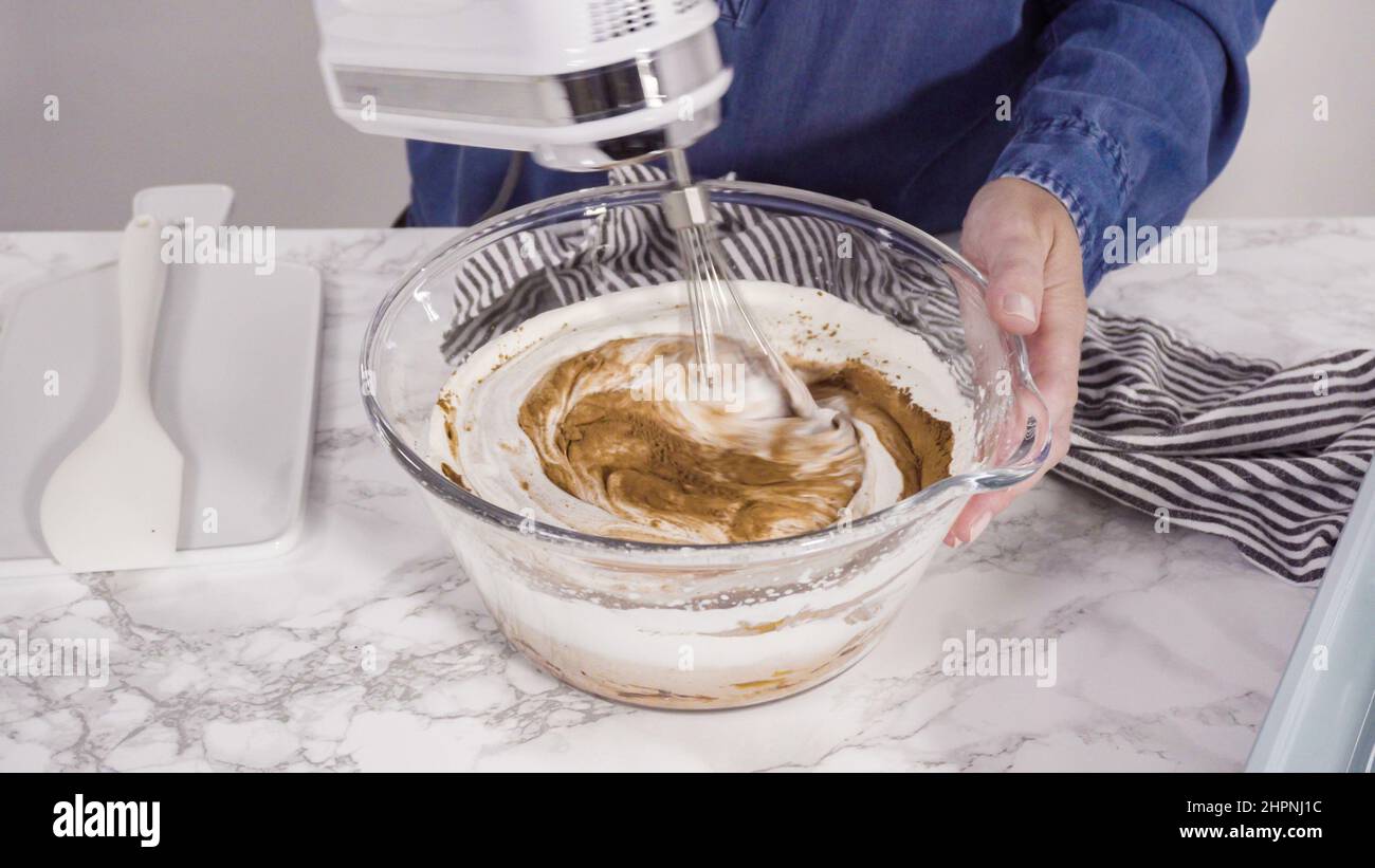 Step by step. Preparing homemade chocolate ice cream in a hand kitchen ...