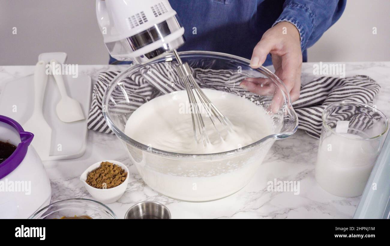 Step by step. Preparing homemade chocolate ice cream in a hand kitchen ...