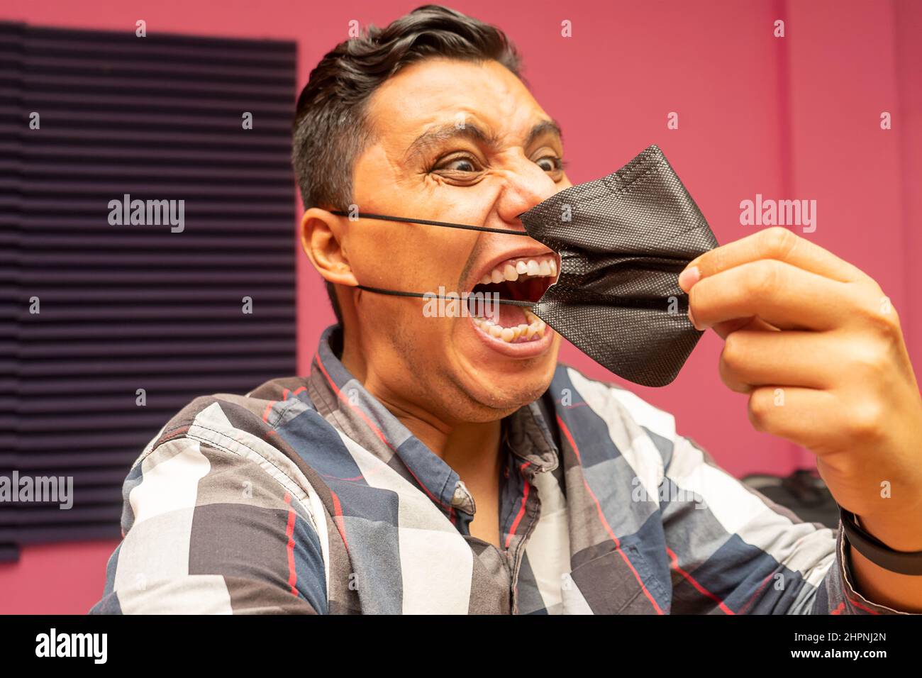 Ripping off mask hi-res stock photography and images - Alamy
