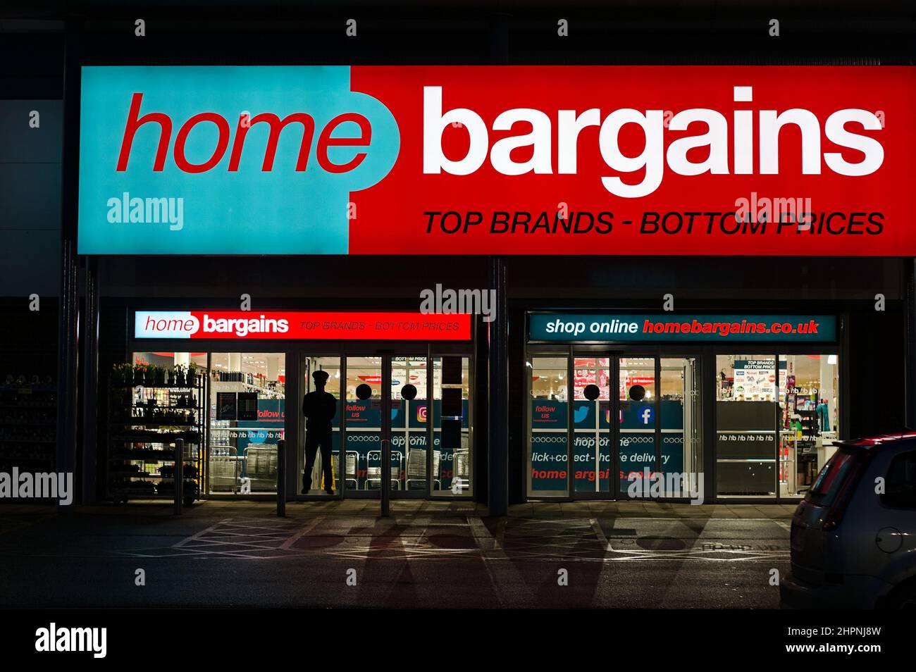 The Home Bargains store at night in the shopping retail park in Boston ...