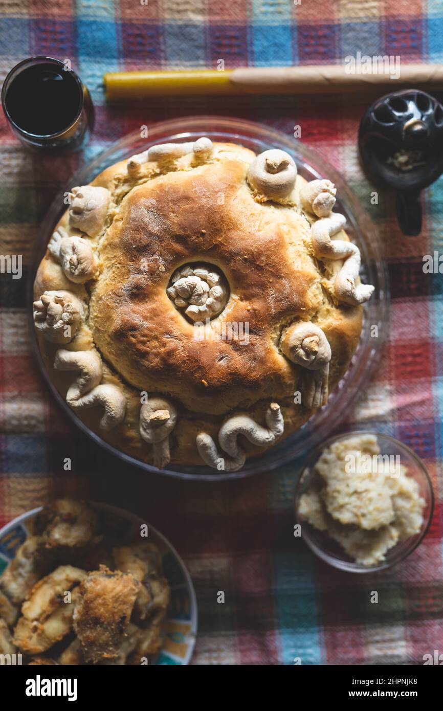 Family's man father hold patron saint celebration A homemade Slava cake ...