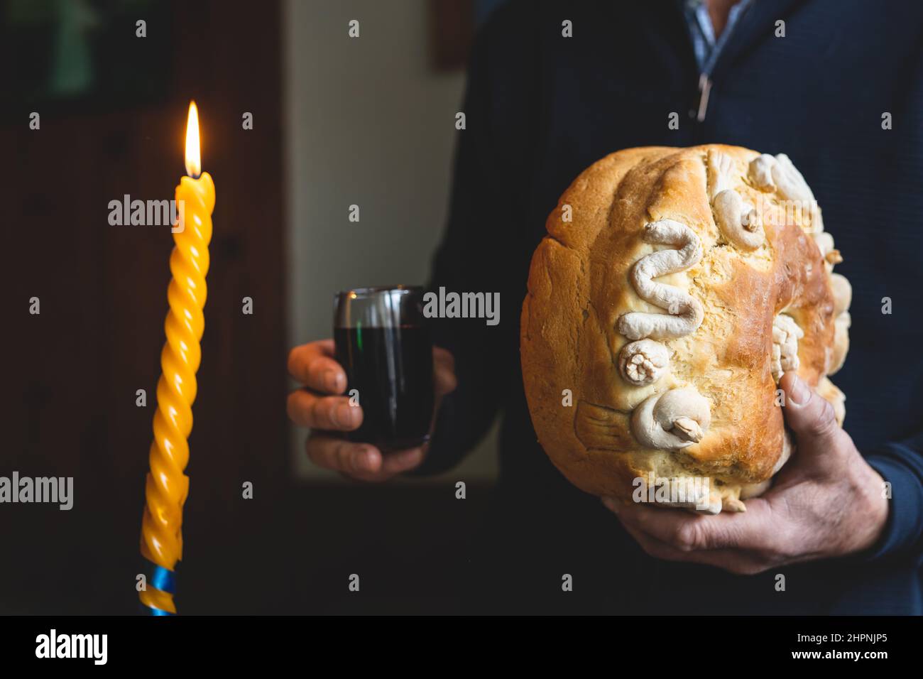 Family's man father hold patron saint celebration A homemade Slava cake ...