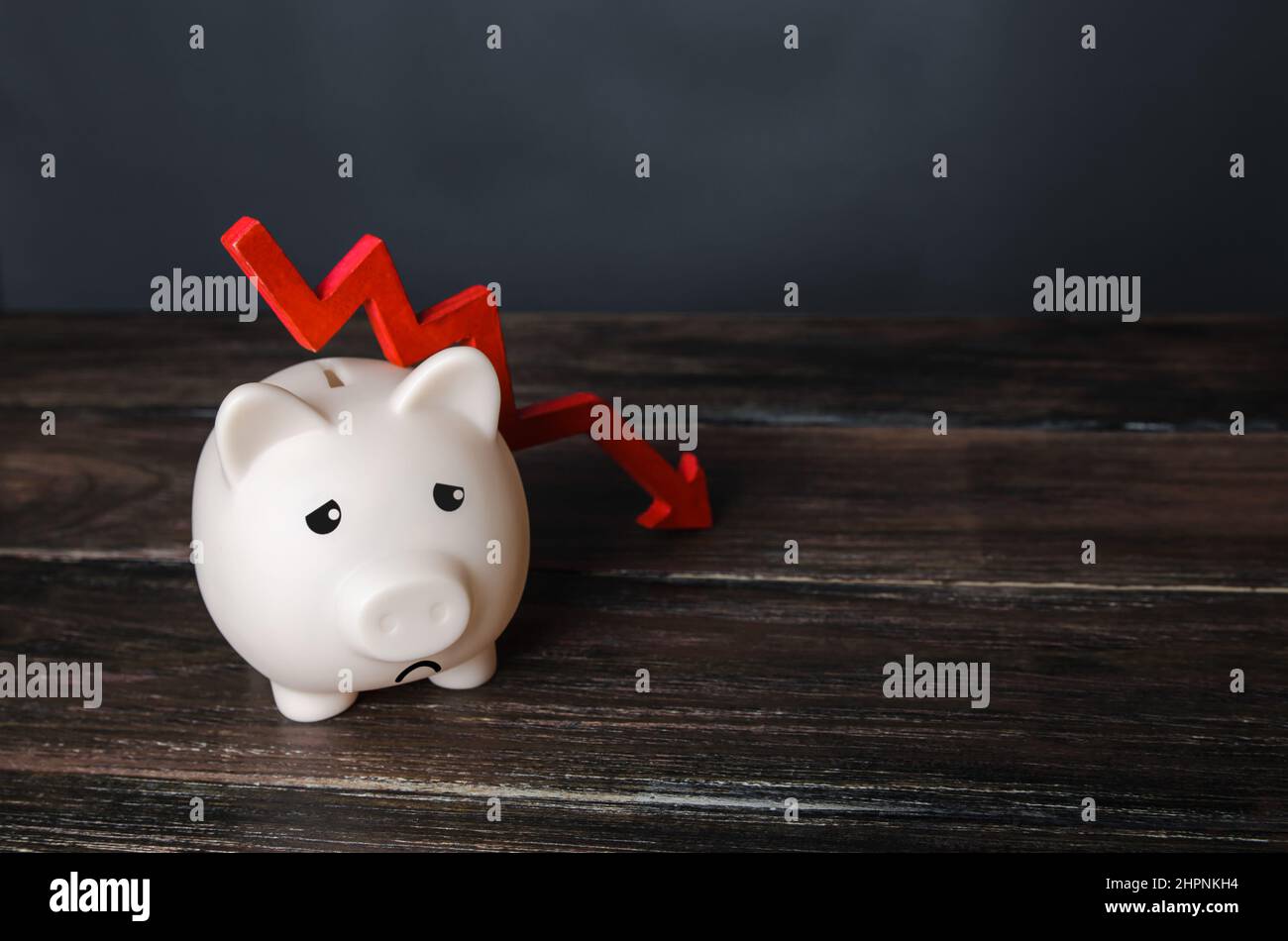 Sad piggy bank and down arrow. Savings and reserves decrease. Inflation ...