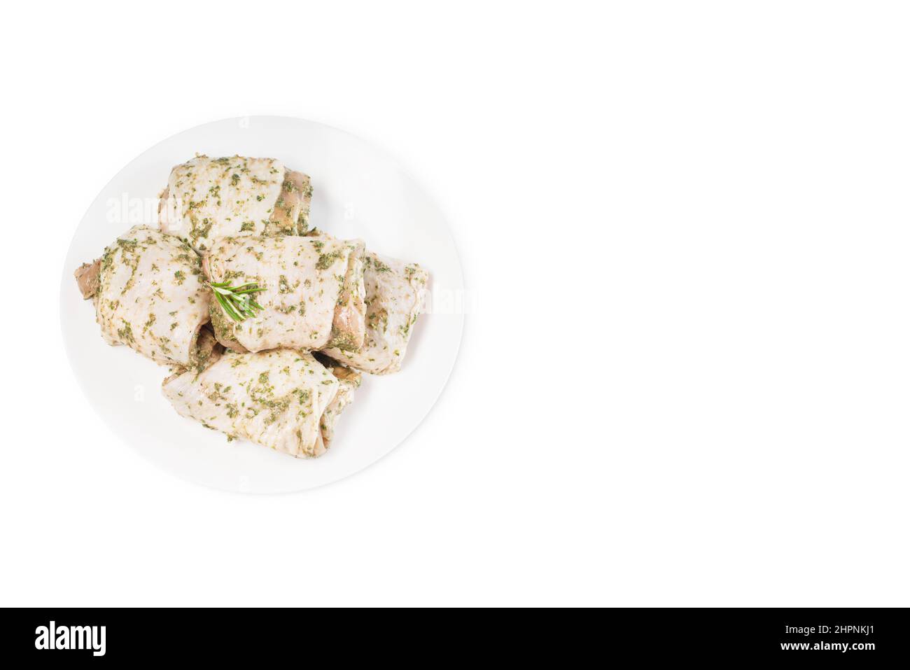 Raw chicken thighs for barbecue in sauce, semi-cooked food.Raw chicken ...