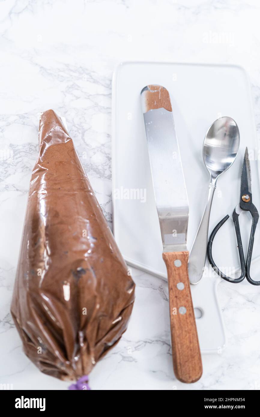 Buttercream frosting in a piping bag for decorating a cake Stock Photo ...