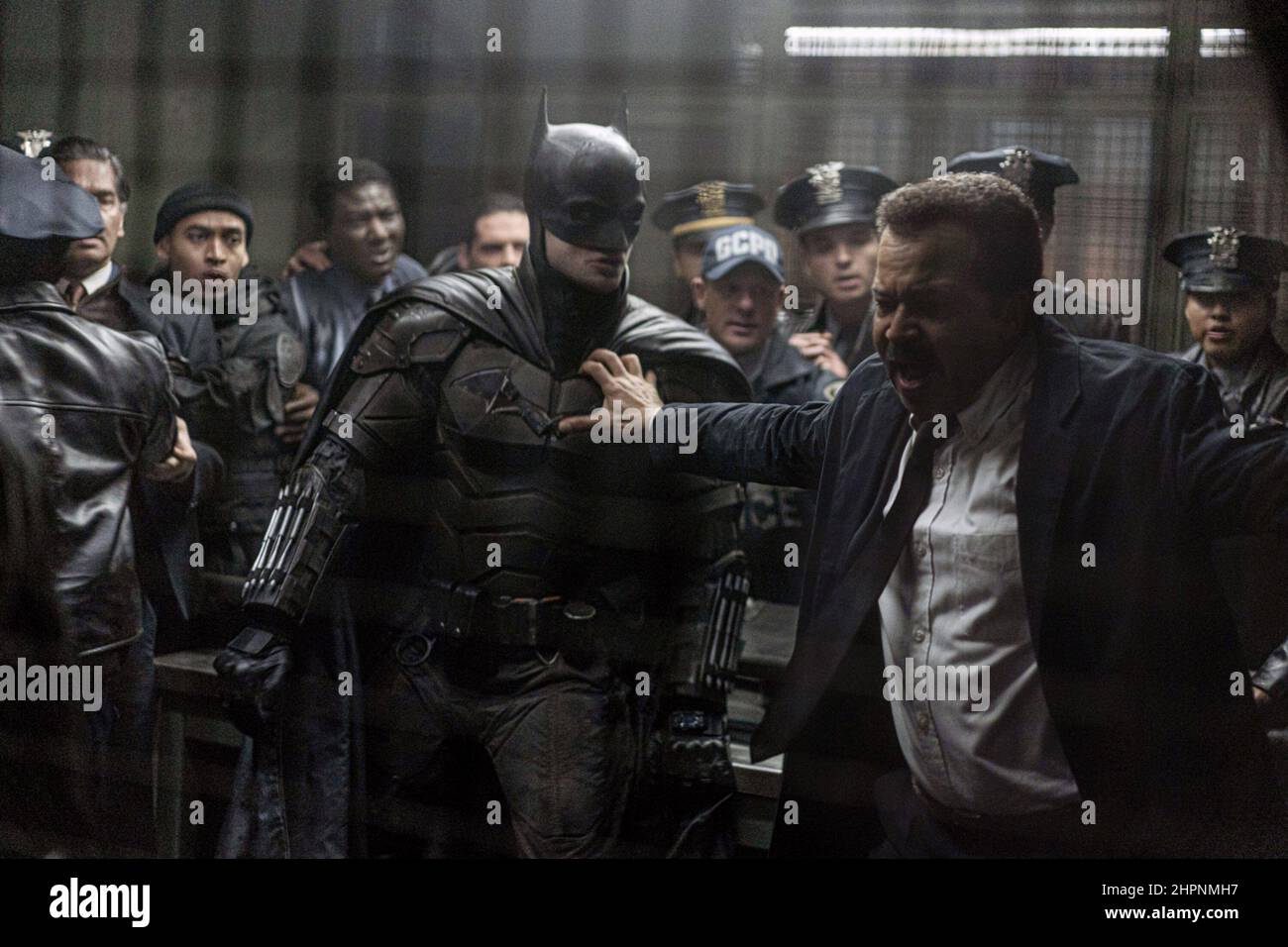 THE BATMAN, front, from left: Robert Pattinson as Batman, Jeffrey ...