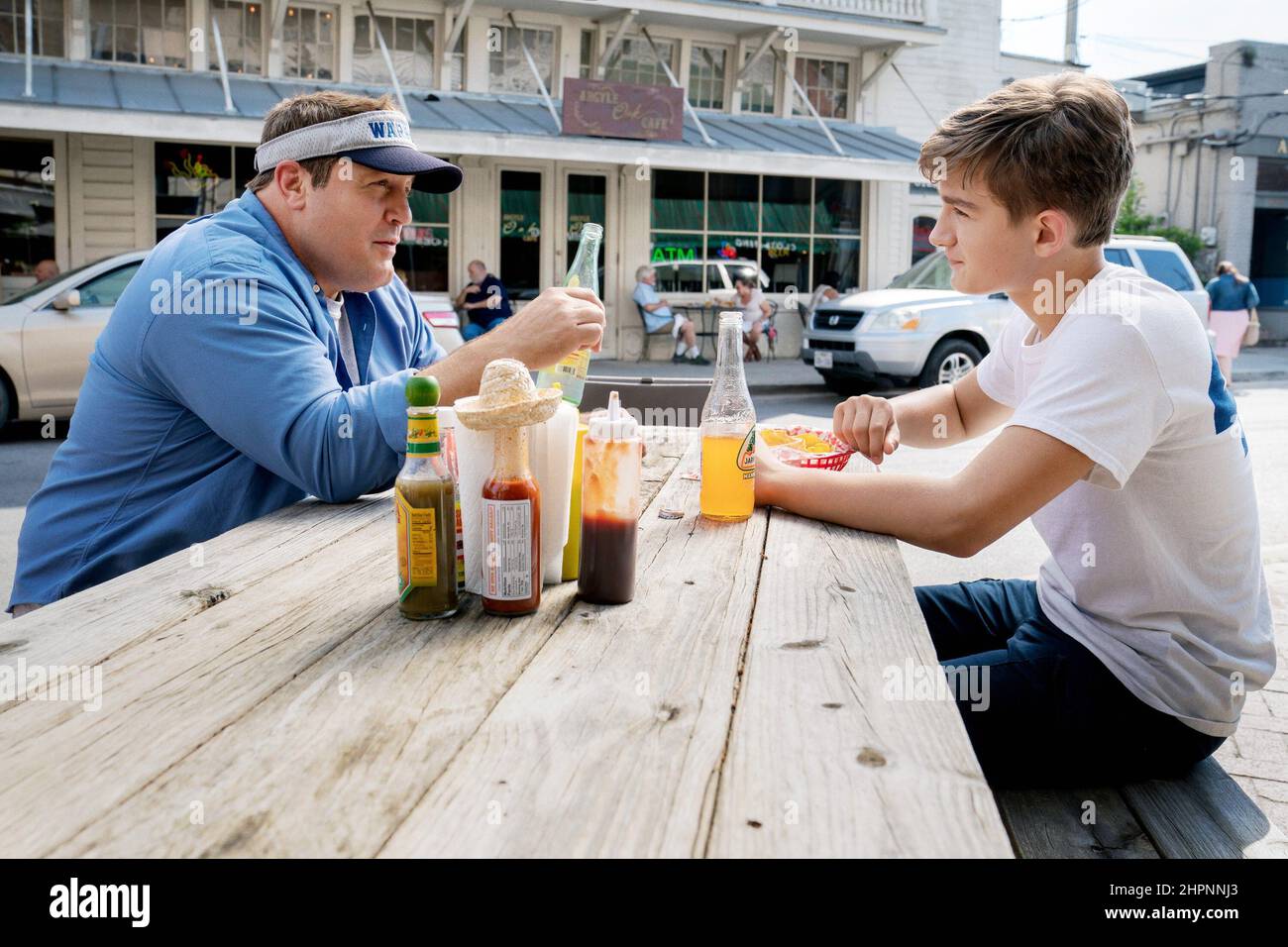 HOME TEAM, from left: Kevin James, Tait Blum, 2022. ph: Scott Yamano ...