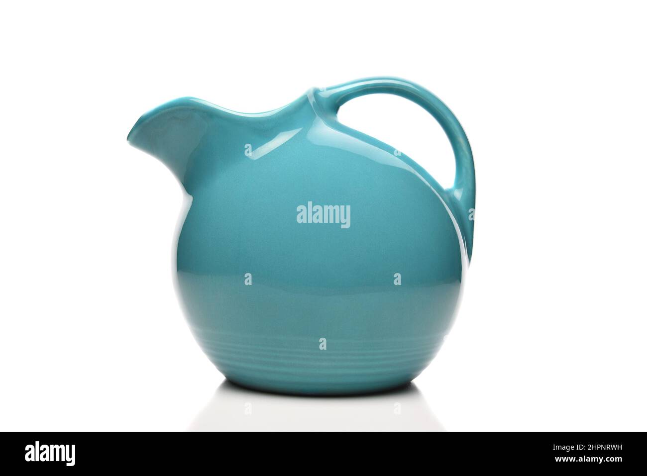 Green pitcher isolated on white Stock Photo - Alamy