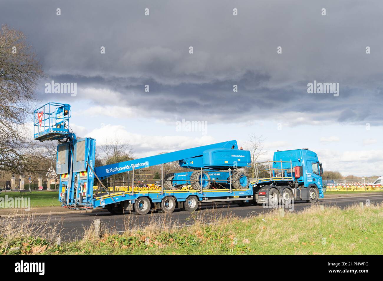 side view of Blue Nationwide Platforms HGV lorry on road A2 Greenwich ...