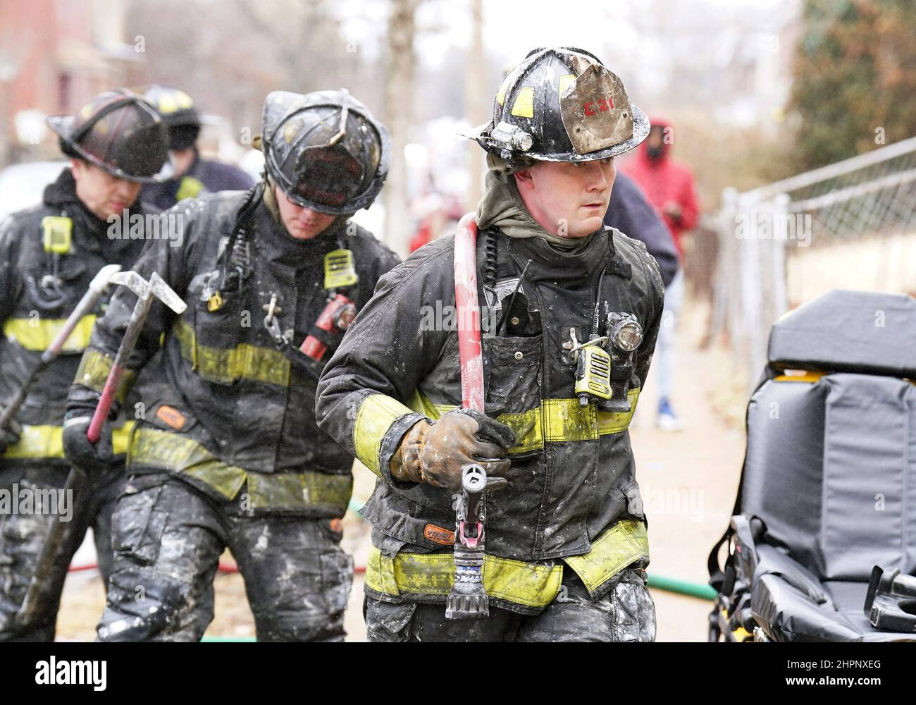 St. Louis, United States. 22nd Feb, 2022. St. Louis firefighters walk a ...