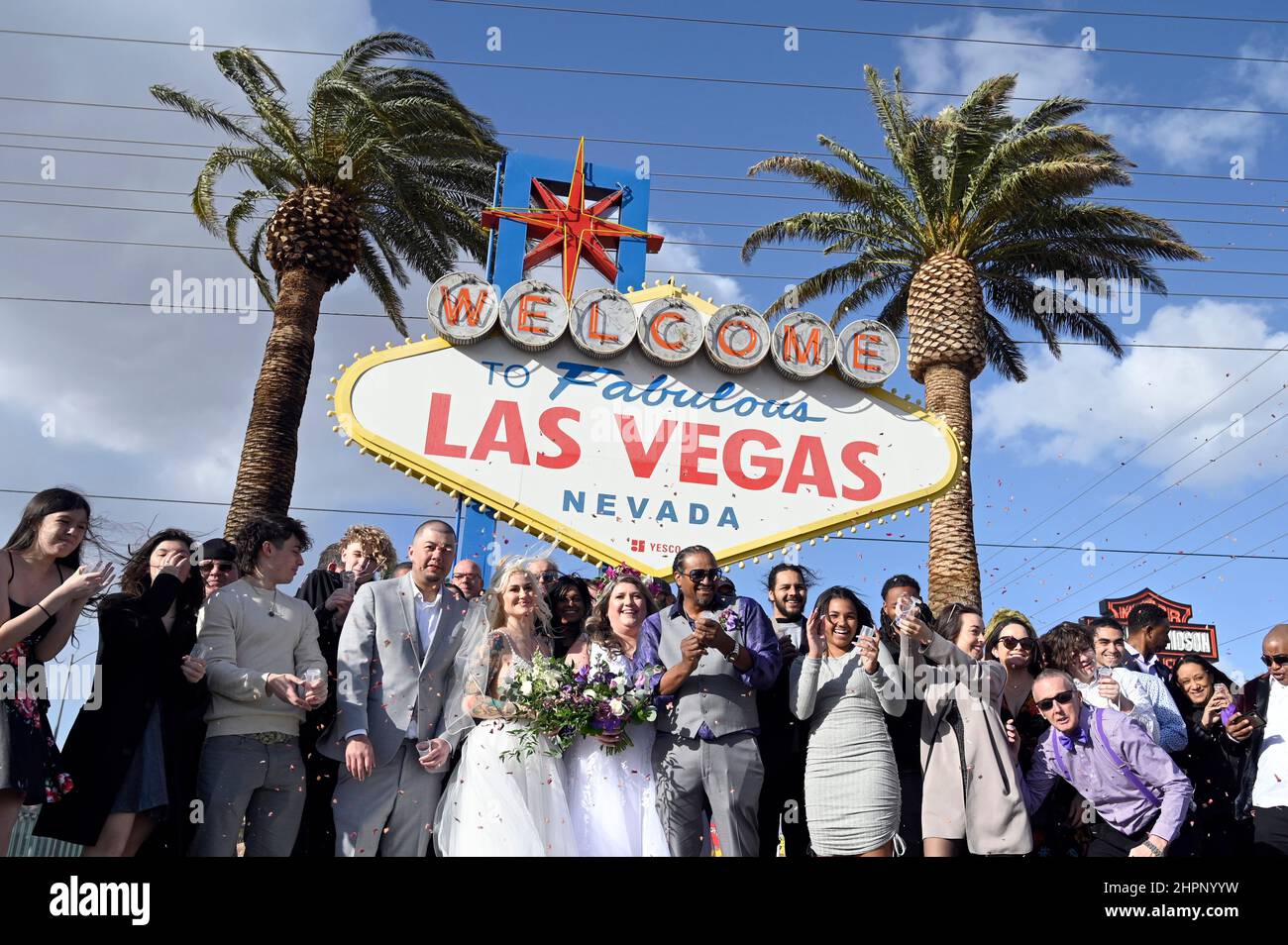 Las Vegas, Nevada, USA. 22nd Feb, 2022. Two wedding parties pose at the ...