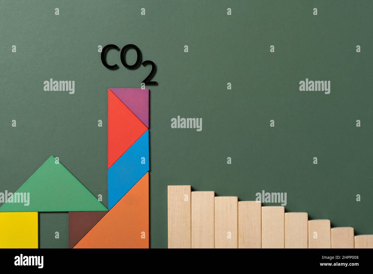 a factory model and decreasing columns showing CO2 reducing trend Stock ...