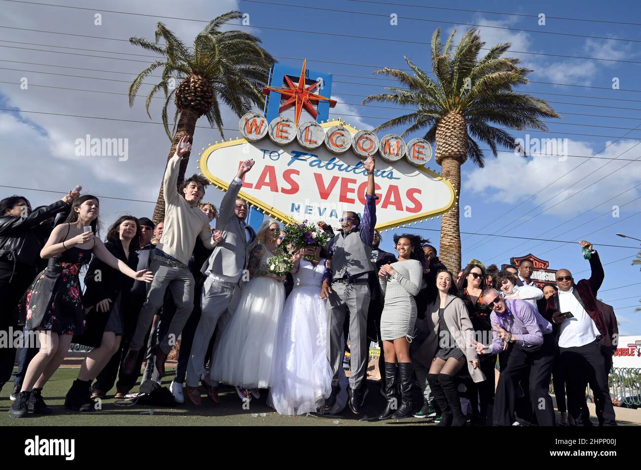 Las Vegas, Nevada, USA. 22nd Feb, 2022. Two wedding parties cheer for a ...
