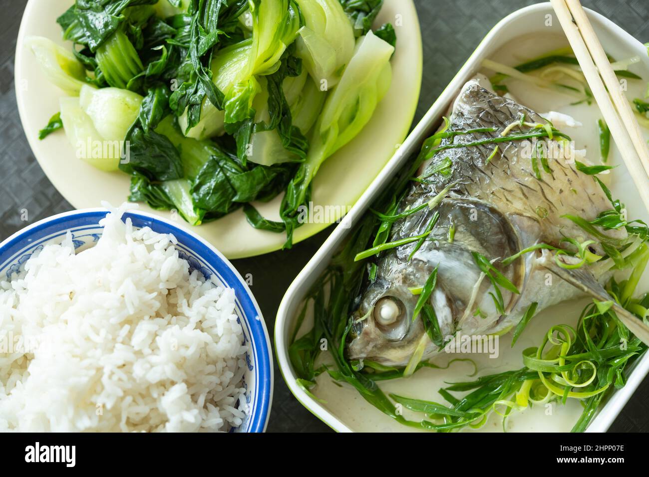top view fast food of steamed fish and vegetable and rice at horizontal ...