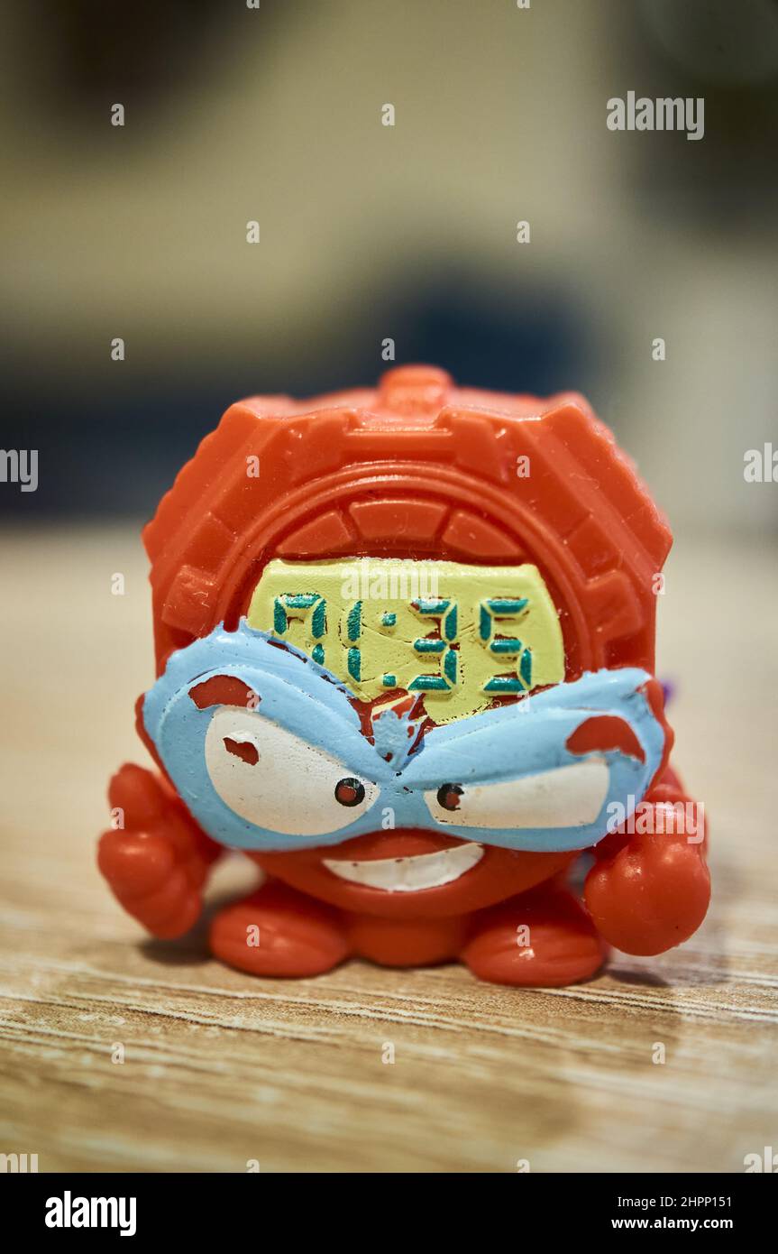 Vertical shot of a SuperThings clock toy figurine showing time Stock ...