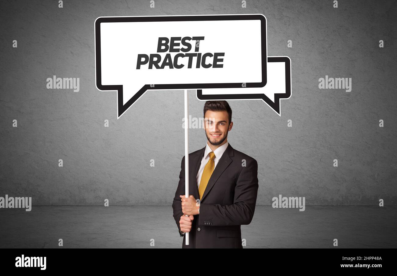 business person in casual holding road sign Stock Photo - Alamy