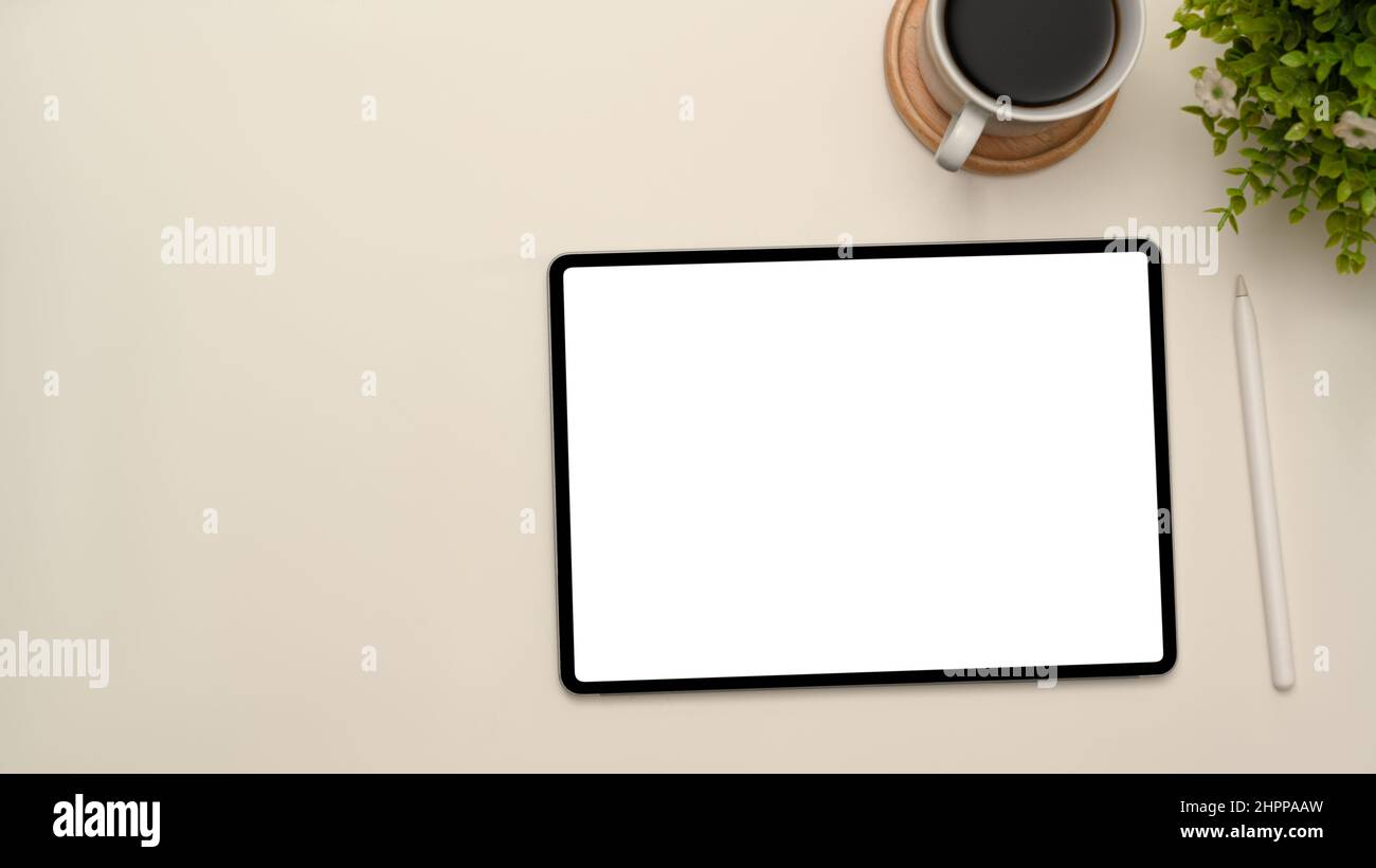 White workspace background with digital tablet touchpad white screen ...