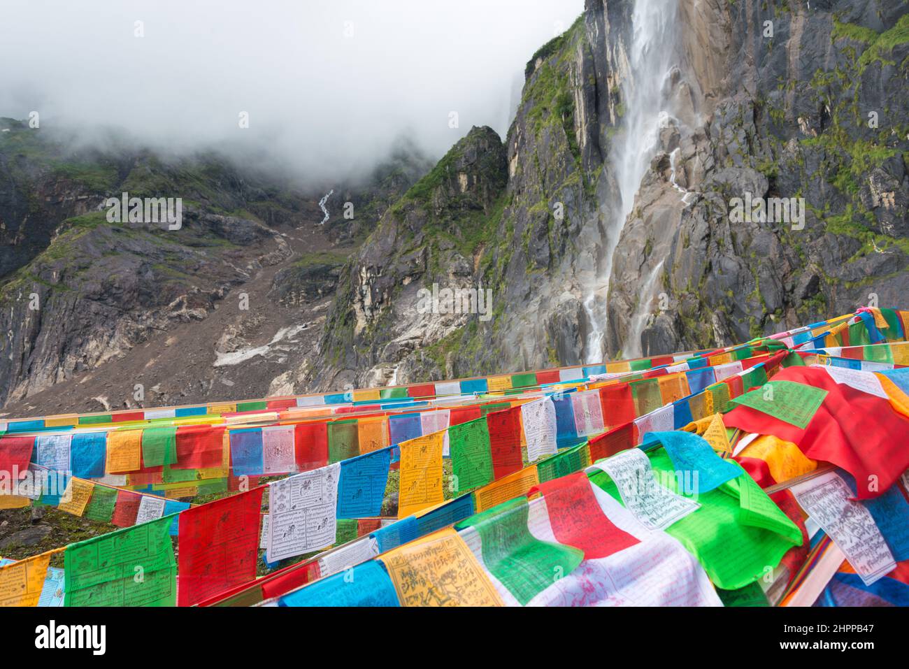 YUBENG, CHINA - Prayer flag at Yubeng Village. a famous landmark in the ...