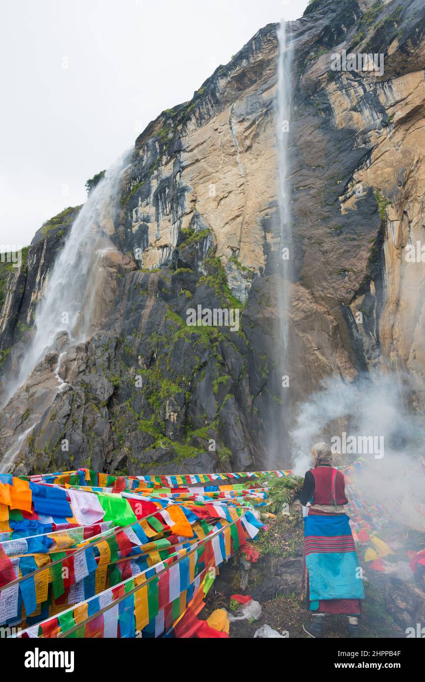 YUBENG, CHINA - Holy Waterfall at Yubeng Village. a famous landscape in ...