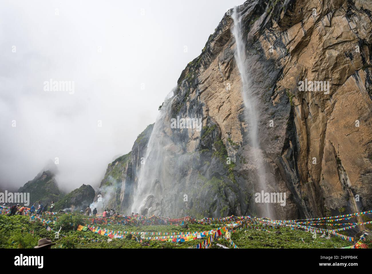 YUBENG, CHINA - Holy Waterfall at Yubeng Village. a famous landscape in ...