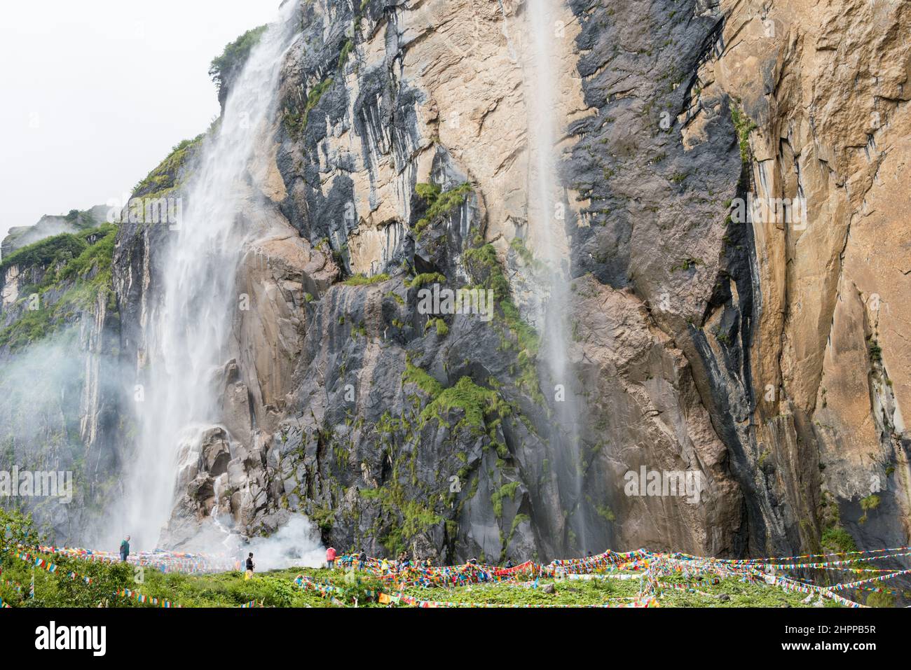 YUBENG, CHINA - Holy Waterfall at Yubeng Village. a famous landscape in ...