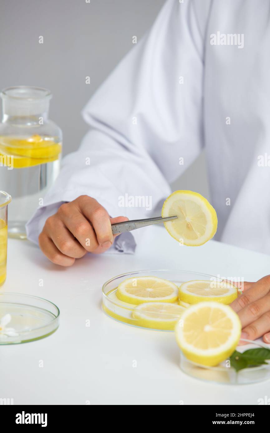 White Background with a scientist for Biological experiment ...