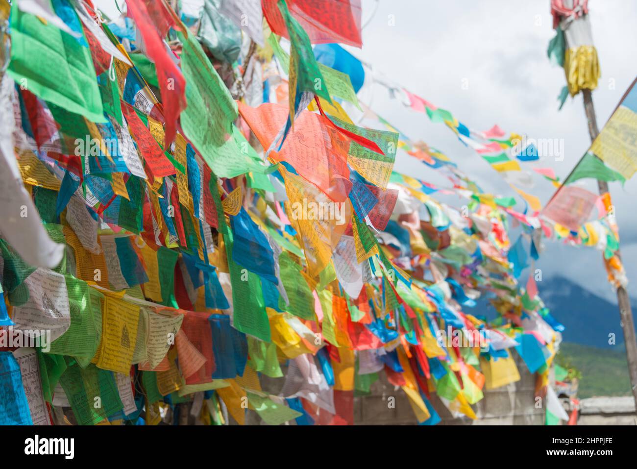 DEQIN, CHINA - Prayer flag at Feilai Temple. a famous Monastery in ...