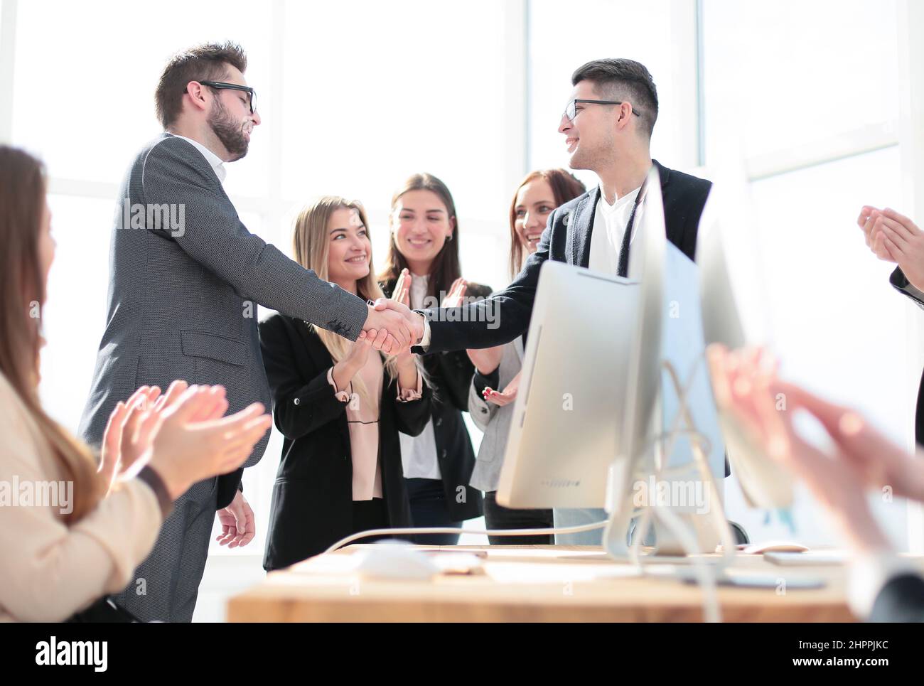 business team congratulating the best employee of the company Stock ...