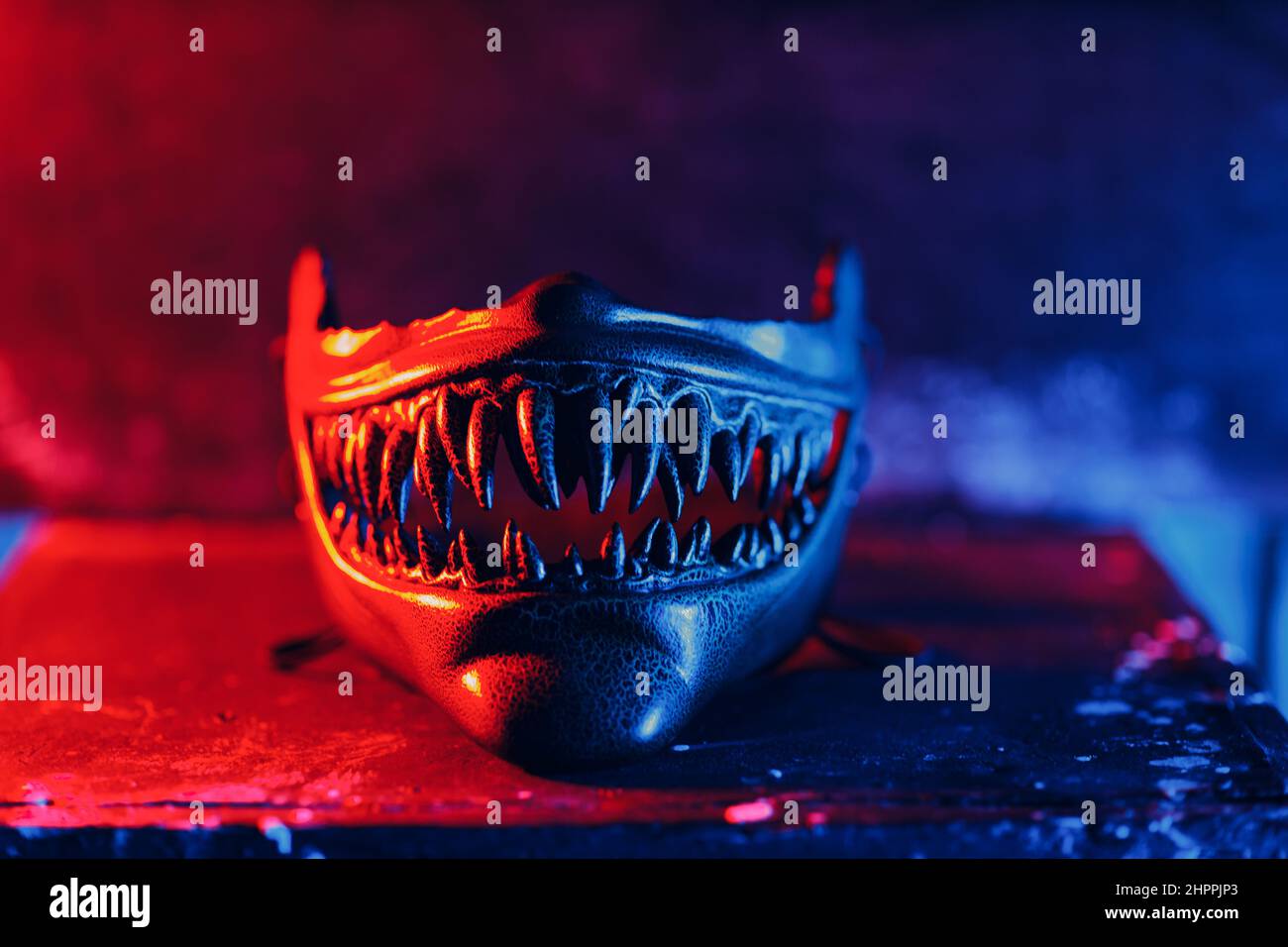 Scary plastic mask. Artisan craftsman create mask based on plaster cast ...