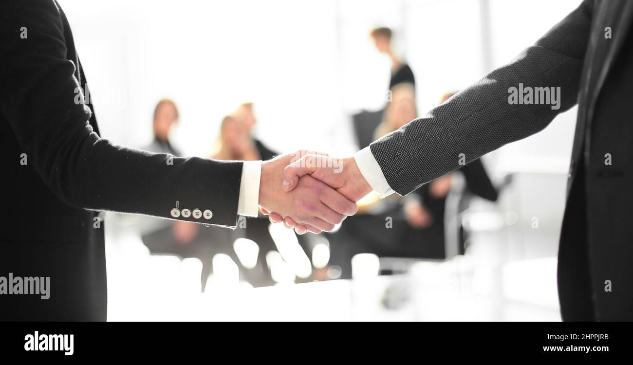 close up. business handshake on an office background Stock Photo - Alamy
