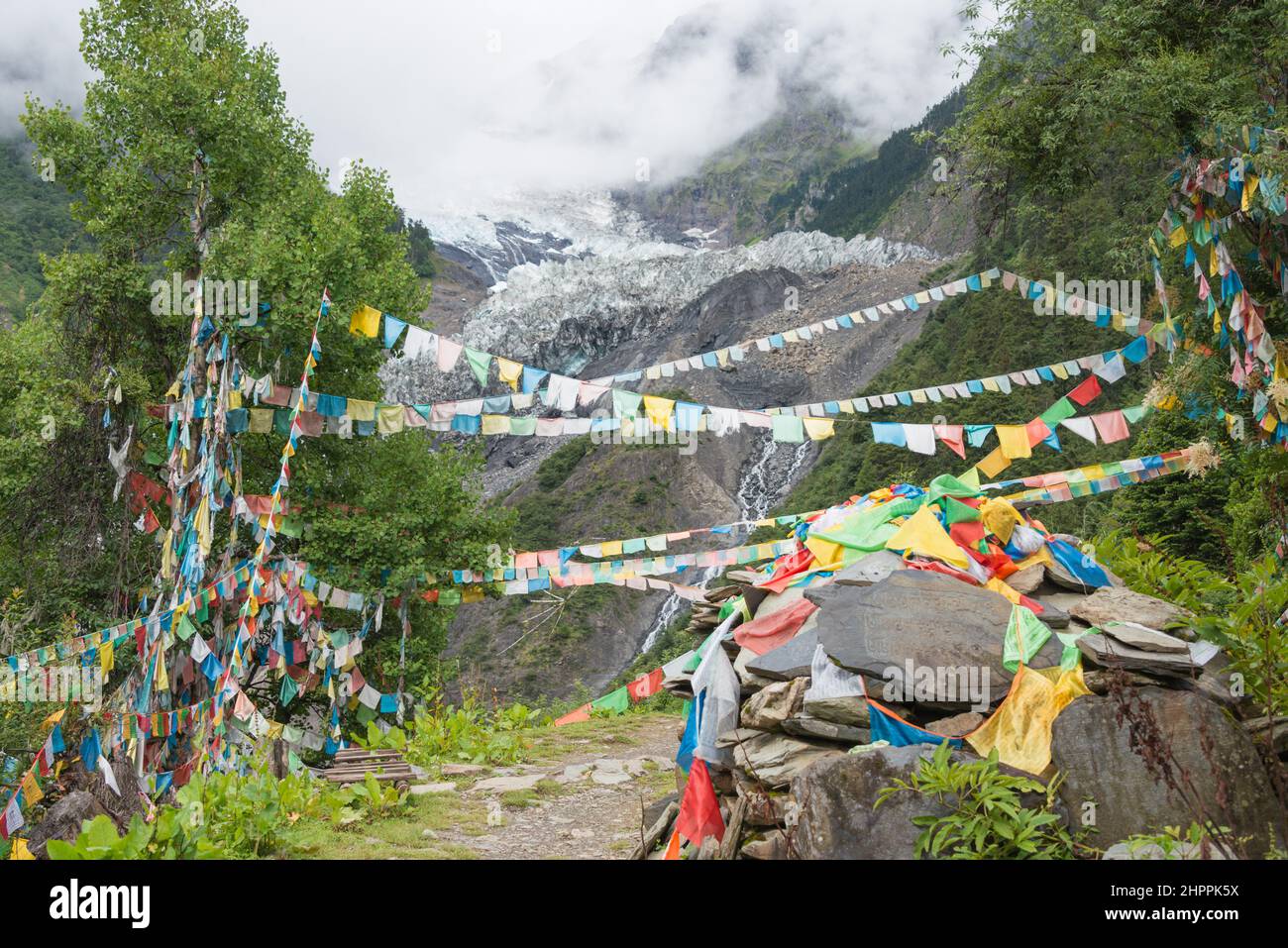 DEQIN, CHINA - Lianhua Temple at Minyong Glacier. a famous landscape in ...