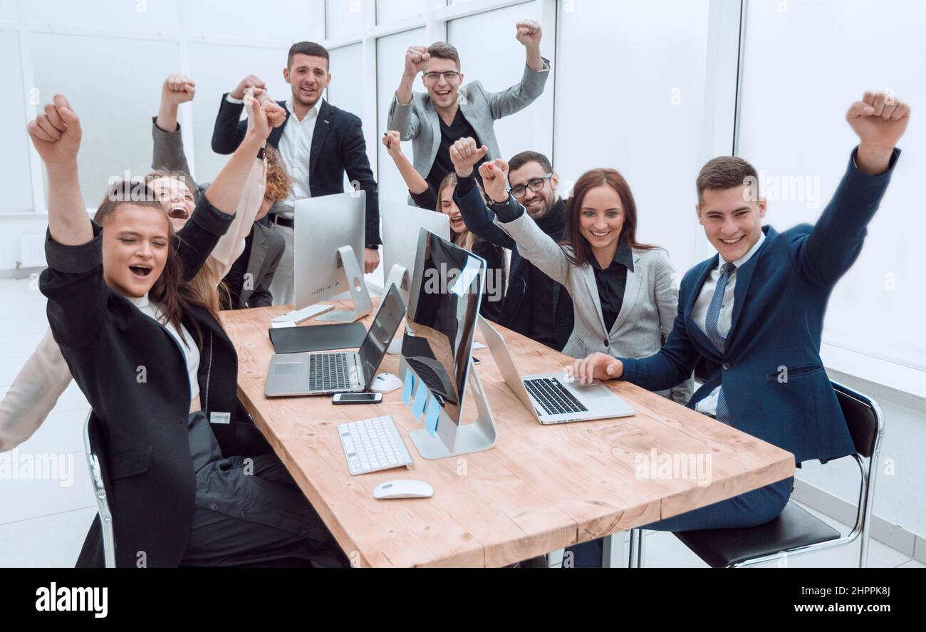 group of young employees in the workplace Stock Photo - Alamy