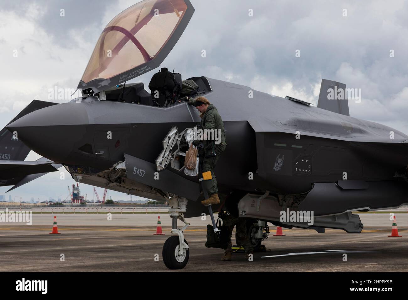 A U.S. Air Force pilot with 365th Fighter Squadron disembarks an F-35A ...
