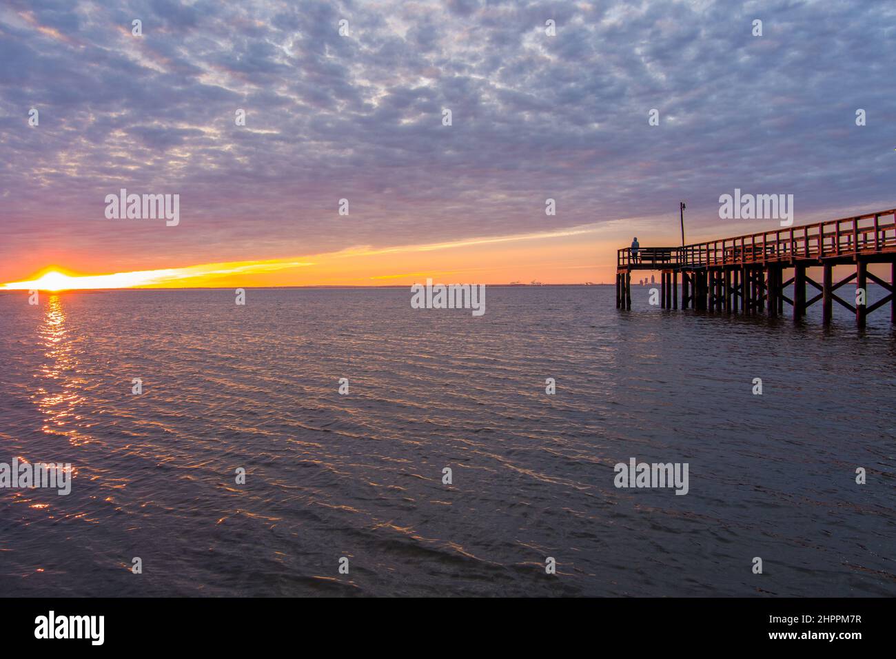 Mobile Bay dramatic sunset Stock Photo - Alamy