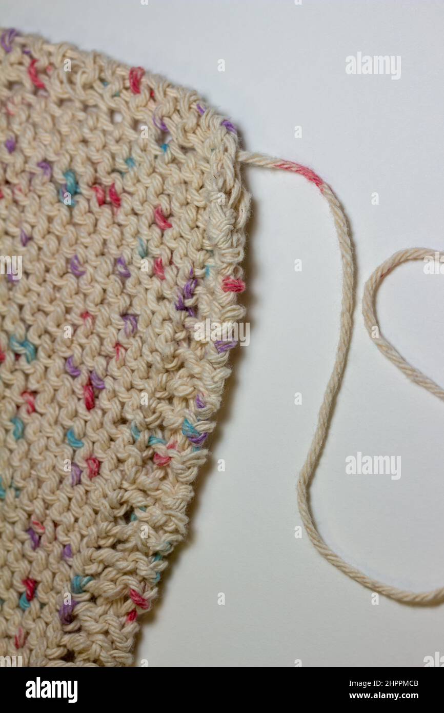 Full frame abstract texture background of hand knitted cotton yarn in a ...