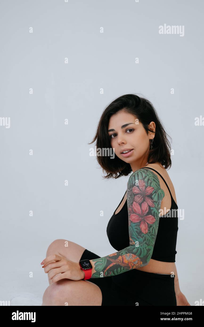 Beautiful Young Female Model in Isolated Studio Setting Stock Photo - Alamy