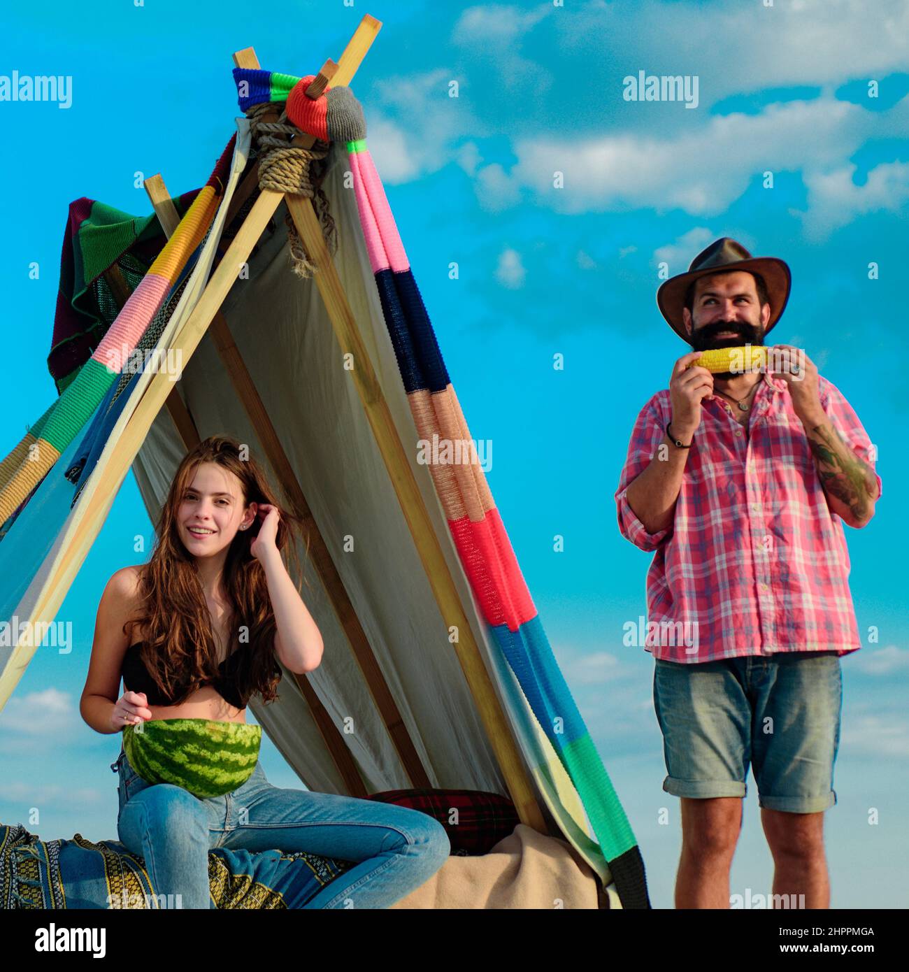 Romantic couple in tent camping on nature background. Adventure for ...