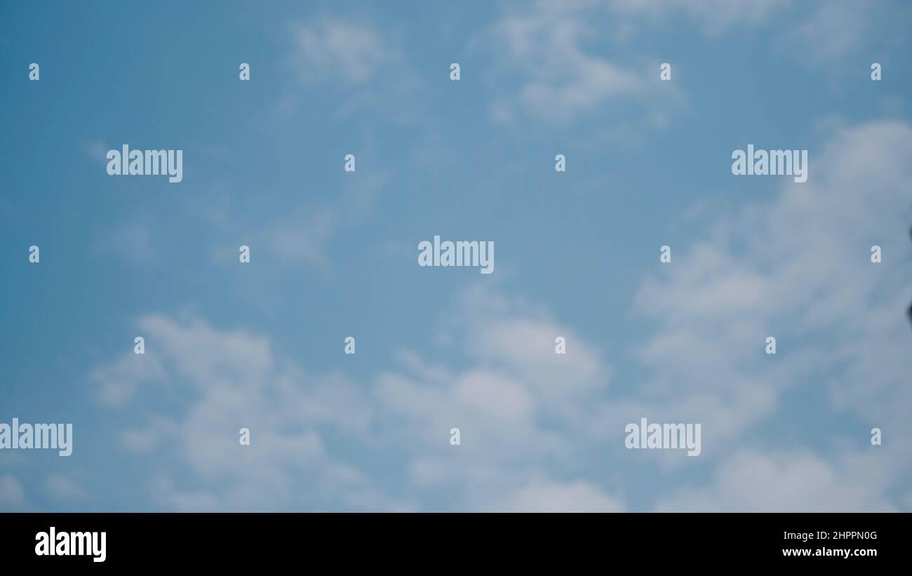 Blue Sky with Light Clouds Backdrop Stock Photo - Alamy